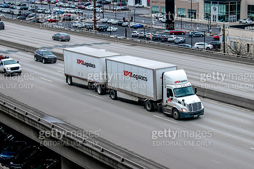 XPO Logistics semi-truck driving on Interstate 90 in Spokane ...