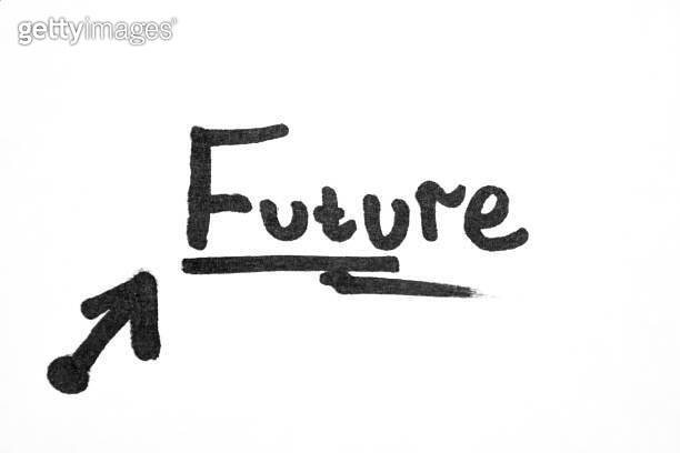 FUTURE word,text,writing with an arrow marker on a white sheet of paper ...