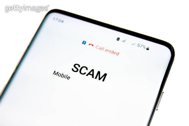 SCAM on your smartphone screen. Scam call, alert, scam, fraud ...