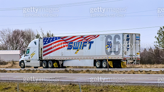 Swift Transport semi-truck pulling a trailer celebrating the trucking ...