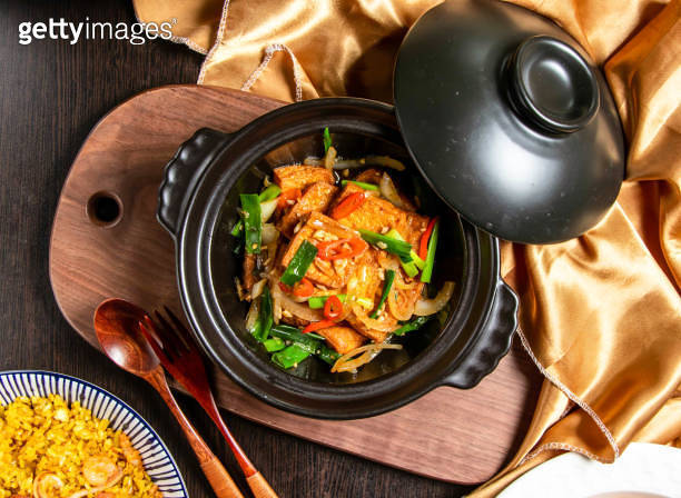 Lao Pi tender tofu with fork and spoon served in dish isolated on ...