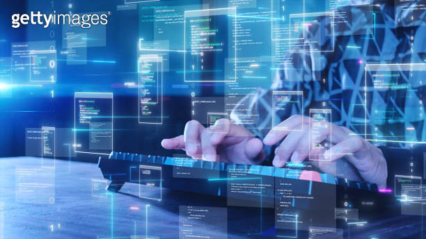 Software developer typing on a keyboard, with digital codes and ...