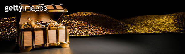 A pile of treasures and gold coins overflowed from the treasure chest ...