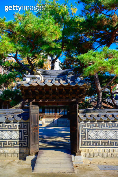 Gate and entrance to traditional Korean house at the folk village park ...