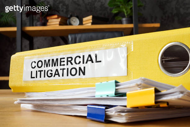 Yellow folder with commercial litigation documents. 이미지 (2090875794 ...