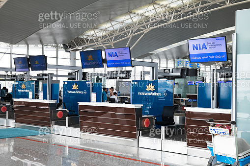 Vietnam Airlines check-in counter area at Hanoi International Airport ...