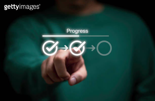 Businessman touching to tick correct mark in checklist with progressive ...