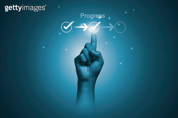 Hand touching to tick correct mark in checklist with progressive ...
