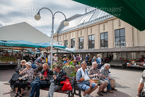 Old people, latvians, senior citizens, seating on benches and resting ...