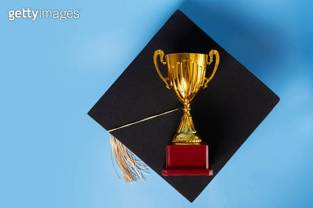 Education prize, graduation cap and trophy cup, university ceremony ...