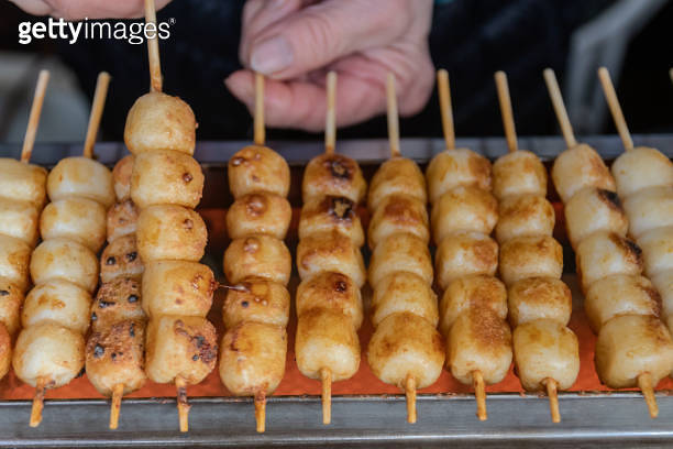 Mitarashi Dango are traditional Japanese rice dumplings on a bamboo ...