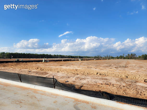 New housing development with lots cleared and roads completed ...