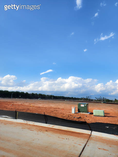 New housing development with lots cleared and roads completed ...