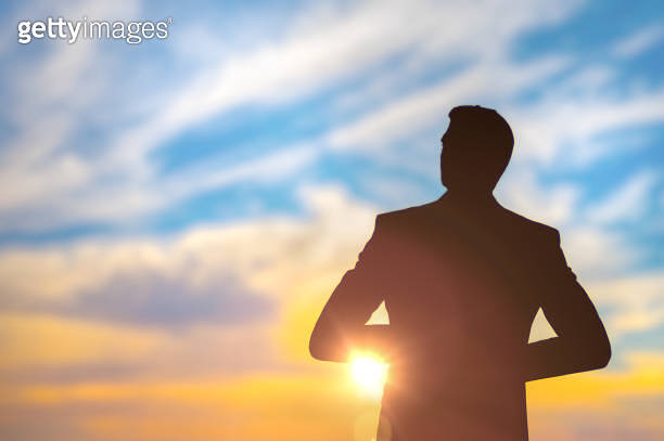 Man silhouette standing confidently businessman, vibrant sunset sky ...