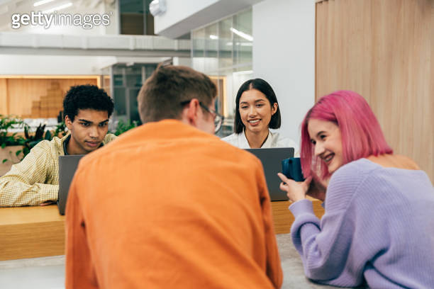 young programmers working on a new project for a start up business ...
