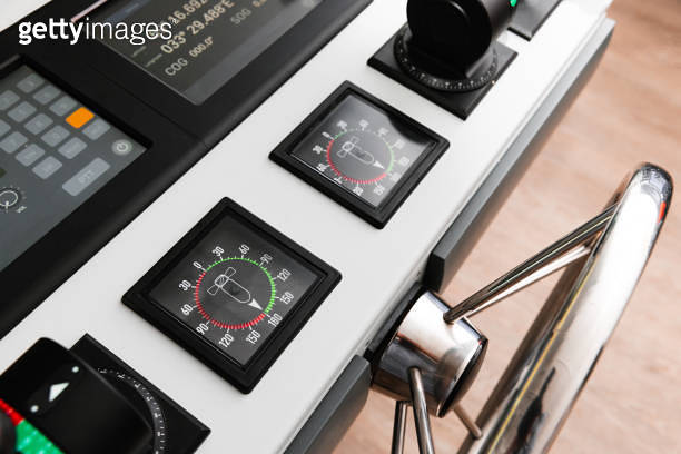 Azimuth thrusters angle indicators mounted in a tug boat control panel ...