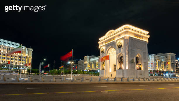 The Triumphal Arch in Astana, decorated with the flags of the ...