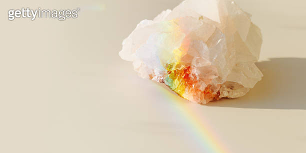 Quartz Prism's Rainbow Reflection at sunlight, close up of clear quartz ...