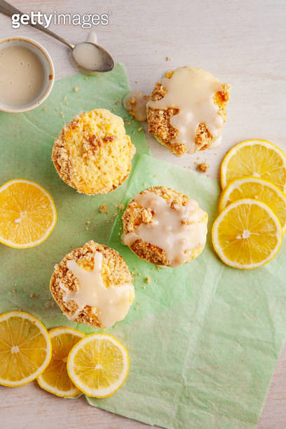 Laying Lemon Muffins. Royal-icing cake. Lemon cake. Lemon muffin coated ...