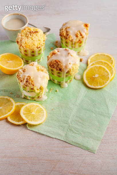 Laying Lemon Muffins. Royal-icing cake. Lemon cake. Lemon muffin coated ...