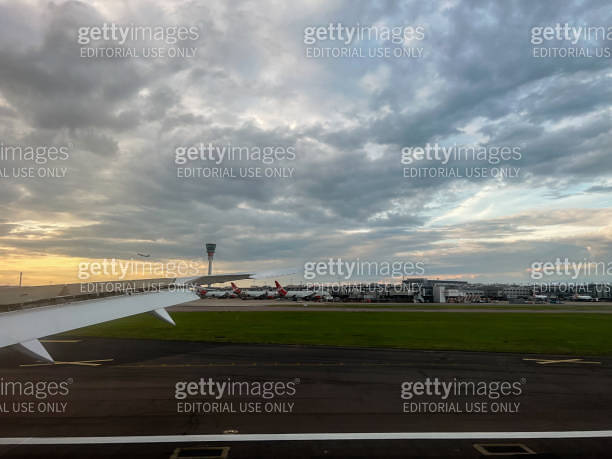 British airways airplane landing at Heathrow Airport runway, airplane ...
