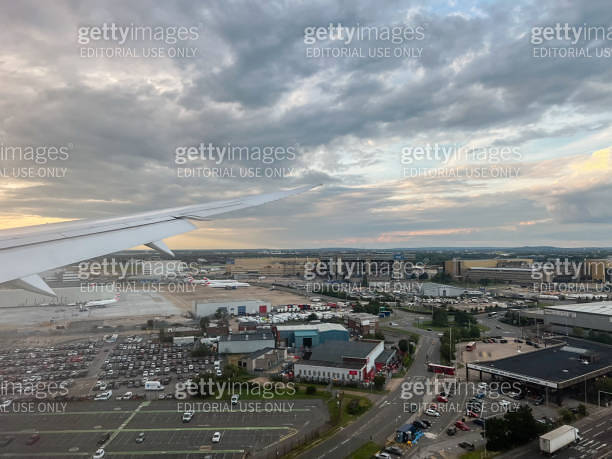 British airways airplane landing at Heathrow Airport, airplane window ...