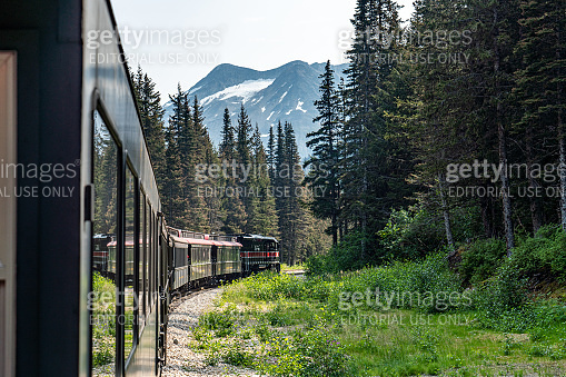 White Pass Summit excursion tour train in the mountains, Alaska, USA ...