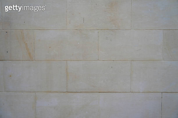 Yellow limestone brick wall detail 이미지 (2153911881) - 게티이미지뱅크