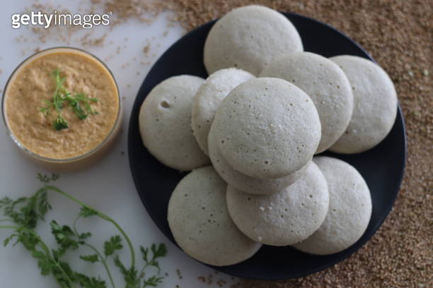 Kodo millet idly. Steamed savory cakes made of kodo millets and lentil ...
