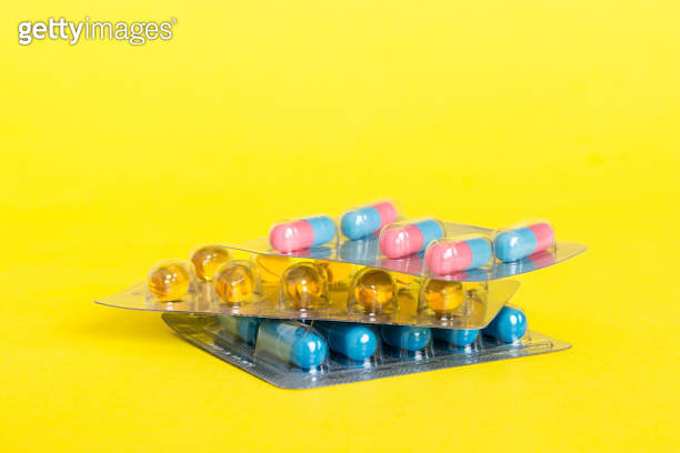 too many different pill cartridges stacked. selective Focus. Packs of ...