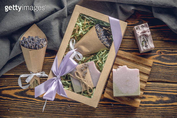Cute gift set handmade of a piece of natural soap and a bouquet of ...