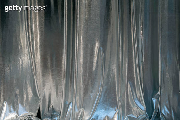 Silver fashionable curtains, fabric in the theatre, night club as ...