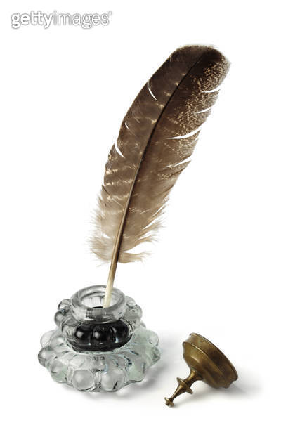 Feather with ink bottle. Calligraphy and beautiful vintage handwriting ...