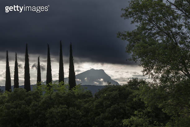 the Sainte Victoire mountain in the light of a cloudy spring morning ...