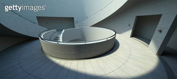 Modern architectural design featuring a circular ramp with shadow ...