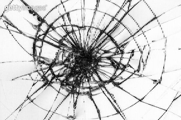 traces of bumps and cracks on a broken white LCD screen, computer ...