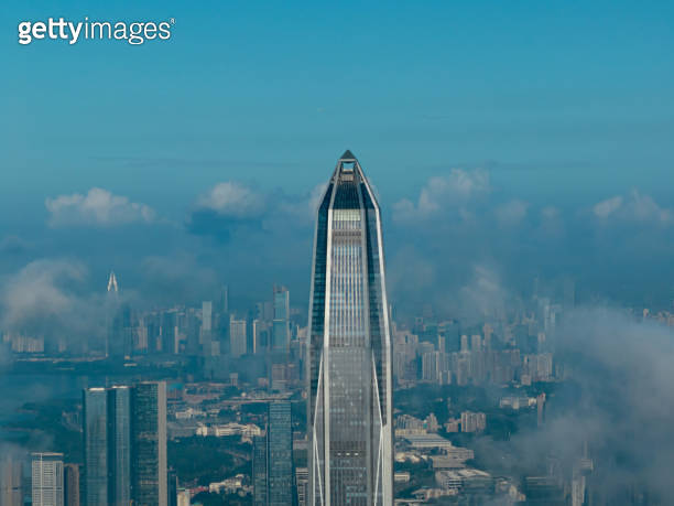 Aerial view of moon and office buildings in shenzhen city, China 이미지 ...