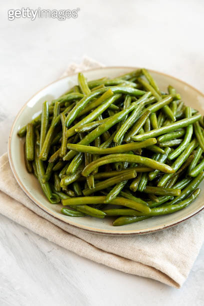 Homemade Sauteed Green Beans on a Plate, low angle view. 이미지 ...