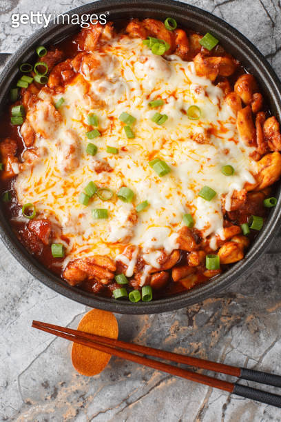 Cheese chicken buldak a marinade of pepper paste and flakes that ...