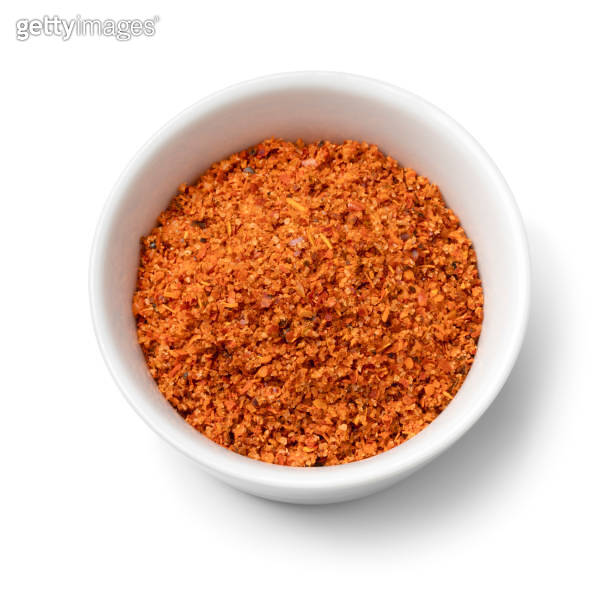 Bowl with a mixture from Mexican seasoning made from chili, lime and ...