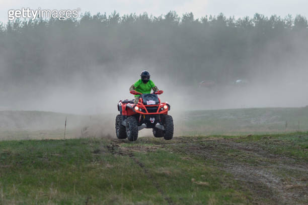 Buggy, Off Road vehicle, ATV, UTV, quad moves on dusty road in autumn ...
