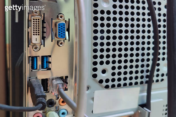 Computer system unit, rear view. The motherboard connectors, power ...