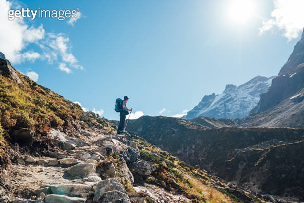 Young hiker backpacker man enjoying valley view in Makalu Barun Park ...