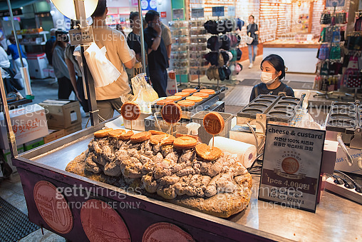 10 won coin Breads are ready to serve visitors at Myeongdong Shopping ...
