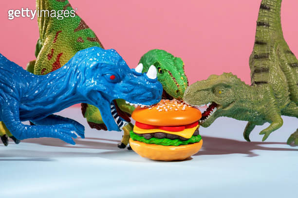 Three cute dinosaurs are fighting over burger. Humor and fast food ...