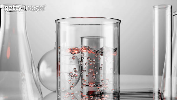 Glass Beaker with boiling liquid, water starts to Boil in a laboratory ...