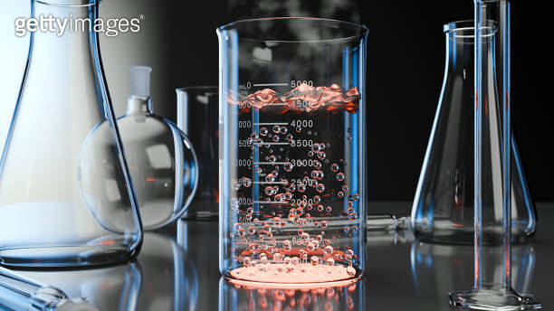 Glass Beaker with boiling liquid, water starts to Boil in a laboratory ...