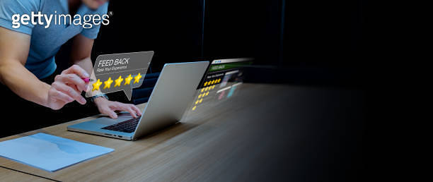 Customer Providing Five-Star Feedback Rating on Digital Interface Using ...