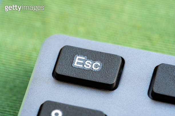 Macro shot showcasing of an Esc key of a modern keyboard, object detail ...