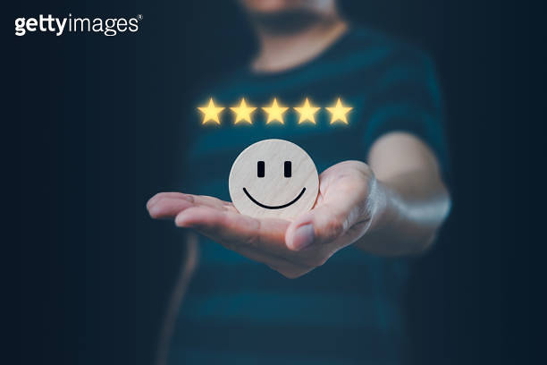 Satisfaction concept, Man holding circular wooden board with smiling ...